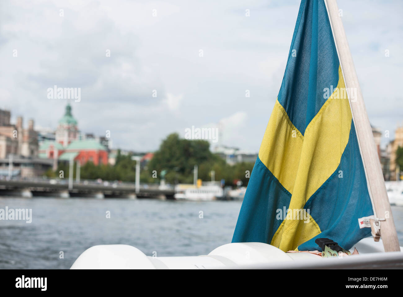 Swedish flag on a boat in Stockholm Stock Photo - Alamy