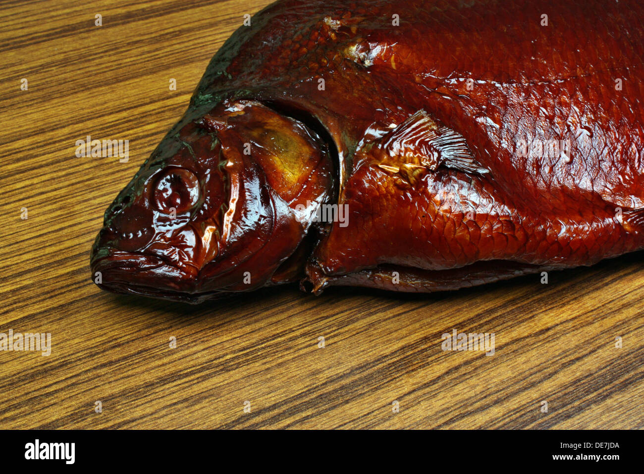 Fresh smoked fish head bream Stock Photo - Alamy