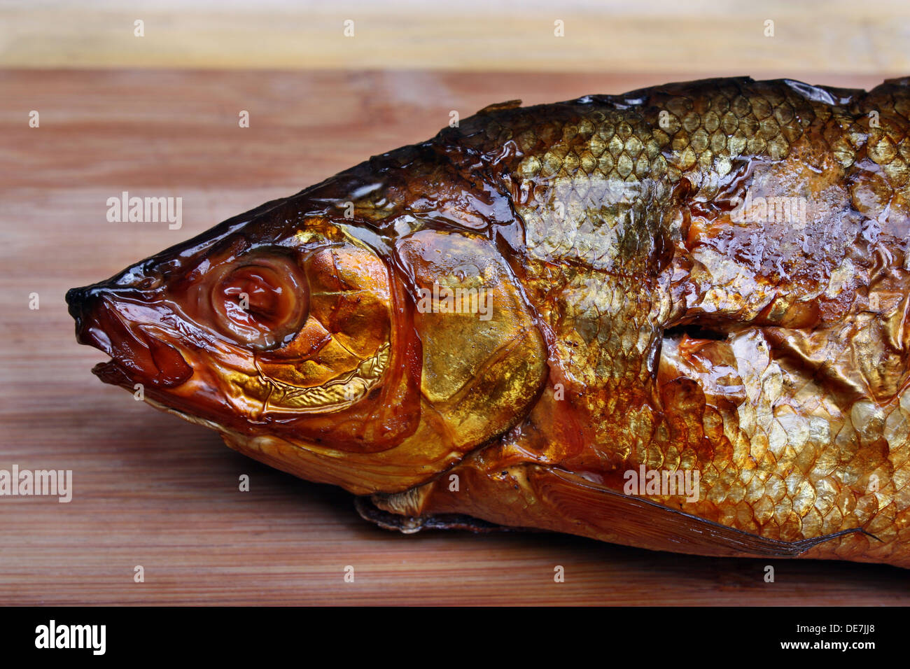 Fresh smoked fish head whitefish Stock Photo - Alamy