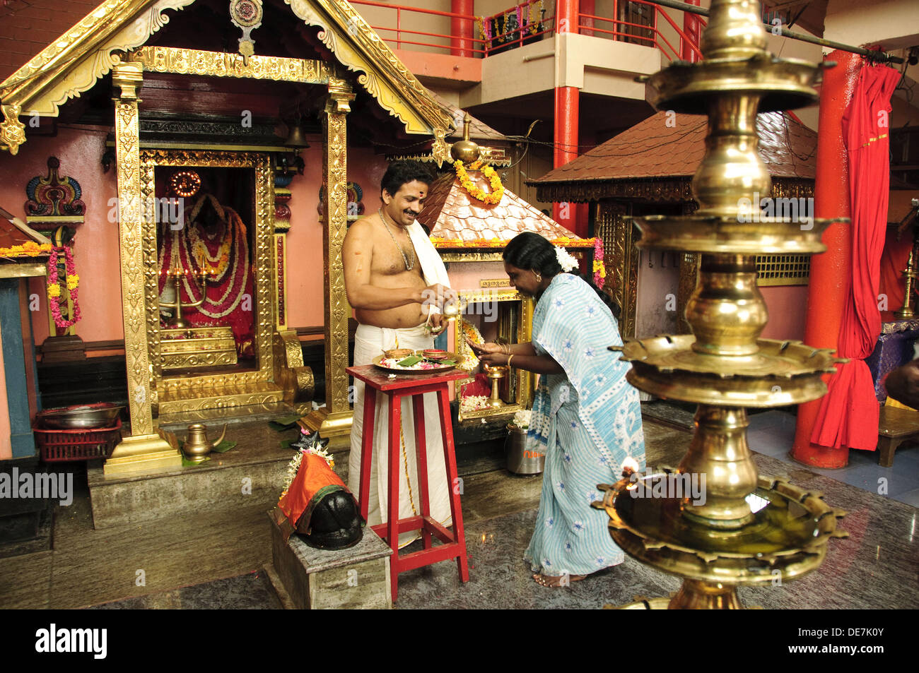Priest blessing man hi-res stock photography and images - Alamy