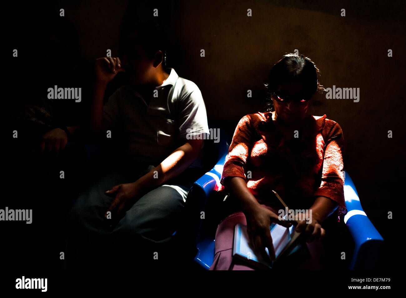 Blind people relax in the changing room of the social club for the ...