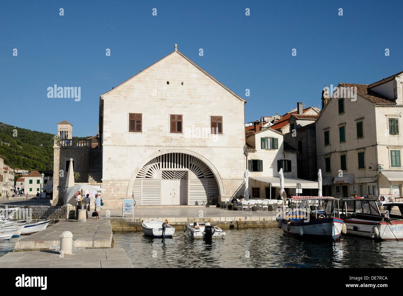 Croatia, Hvar island, Hvar Historical arsenal faces the harbour Stock ...