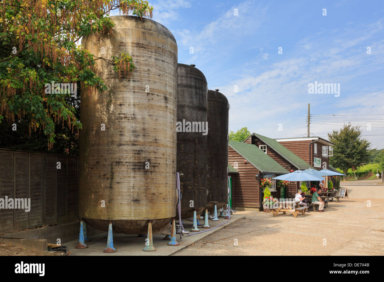 Large cider vats and shop with people sitting outside in award winning ...
