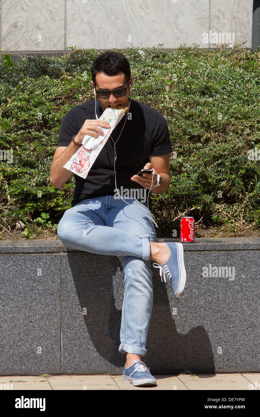 Man male eating hi-res stock photography and images - Alamy