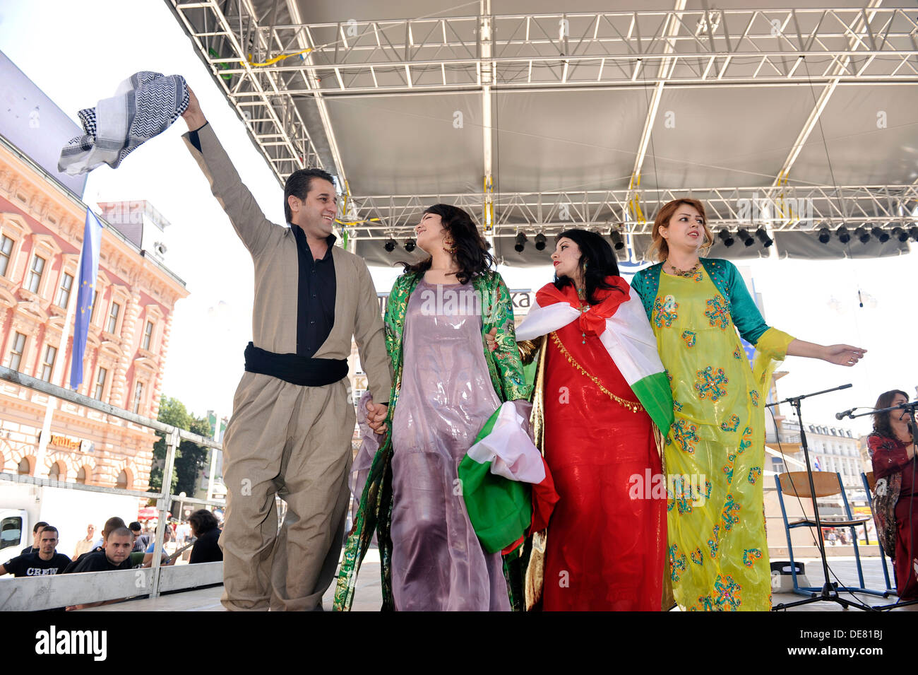 Members of folk groups from Iraq in Kurdish folk costume during the ...