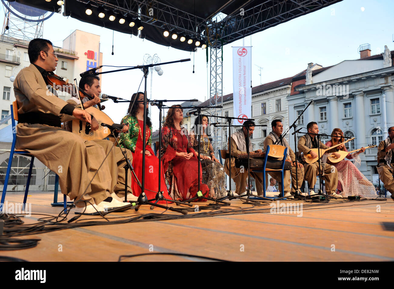 Members of folk groups from Iraq in Kurdish folk costume during the ...