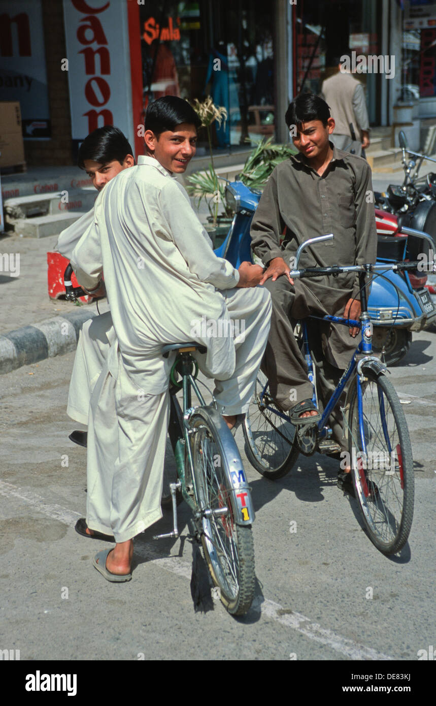 MUSLIM BOYS WITH BICYCLES IN A STREET IN ISLAMABAD, PAKISTAN Stock ...