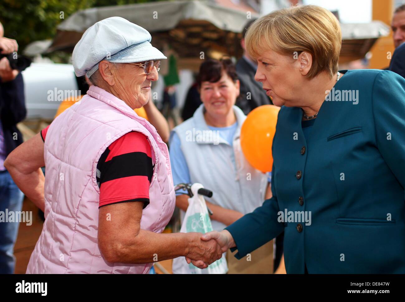 Barth, Germany. 13th Sep, 2013. German Chancellor Angela Merkel (R) is ...