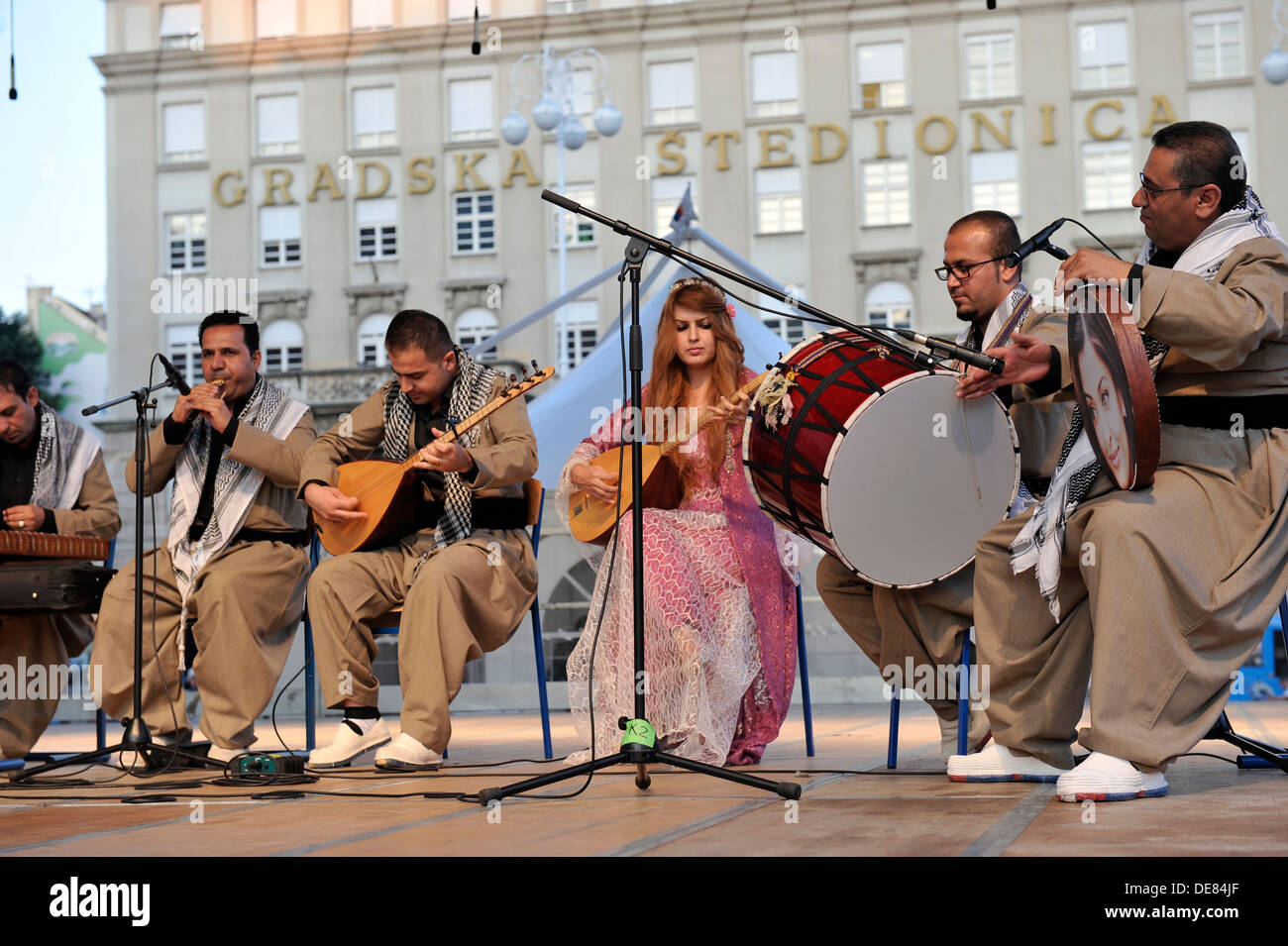 Members of folk groups from Iraq in Kurdish folk costume during the ...