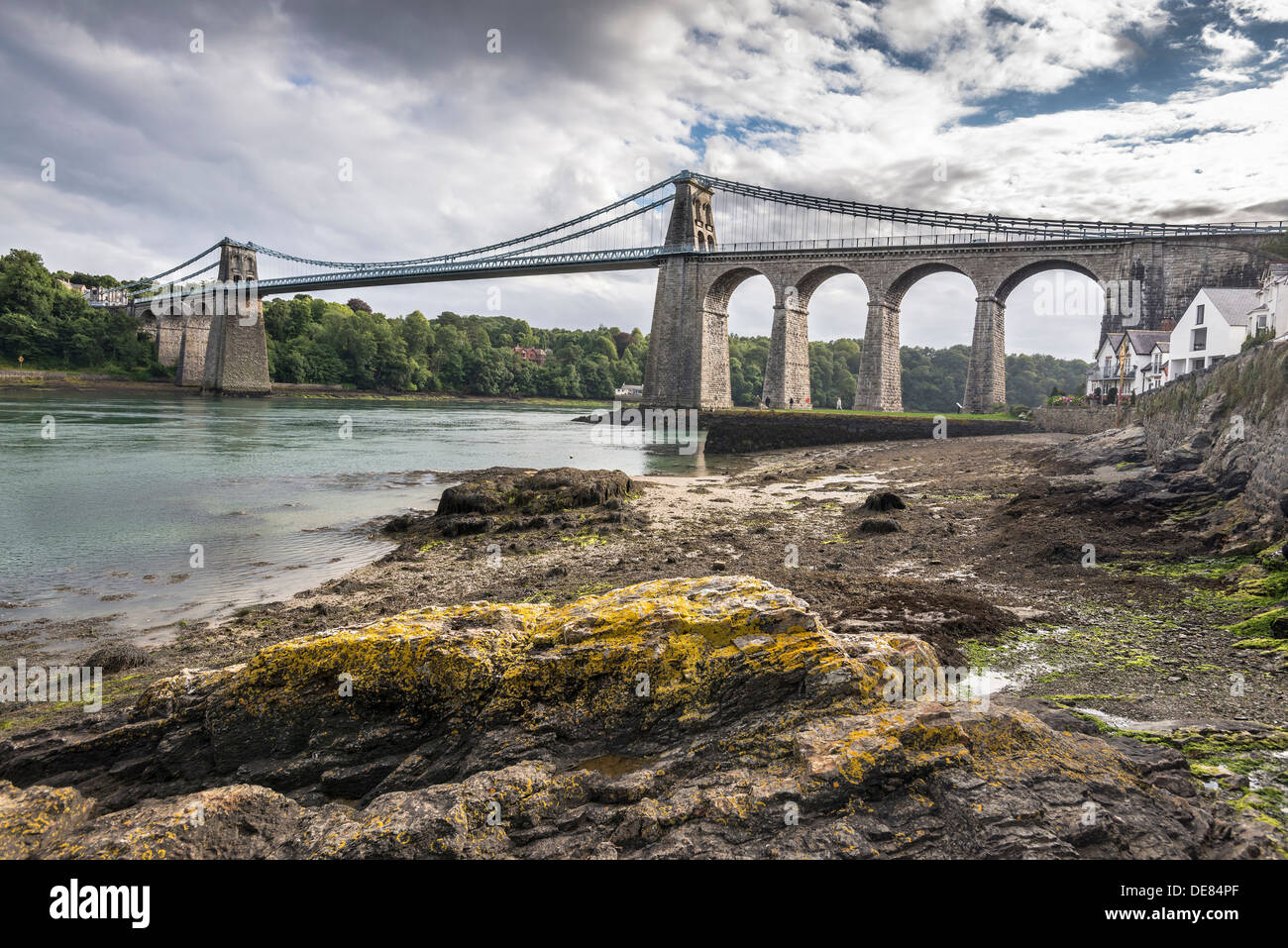 The Menai suspension bridge over the Menai Strait in Gwynedd North ...