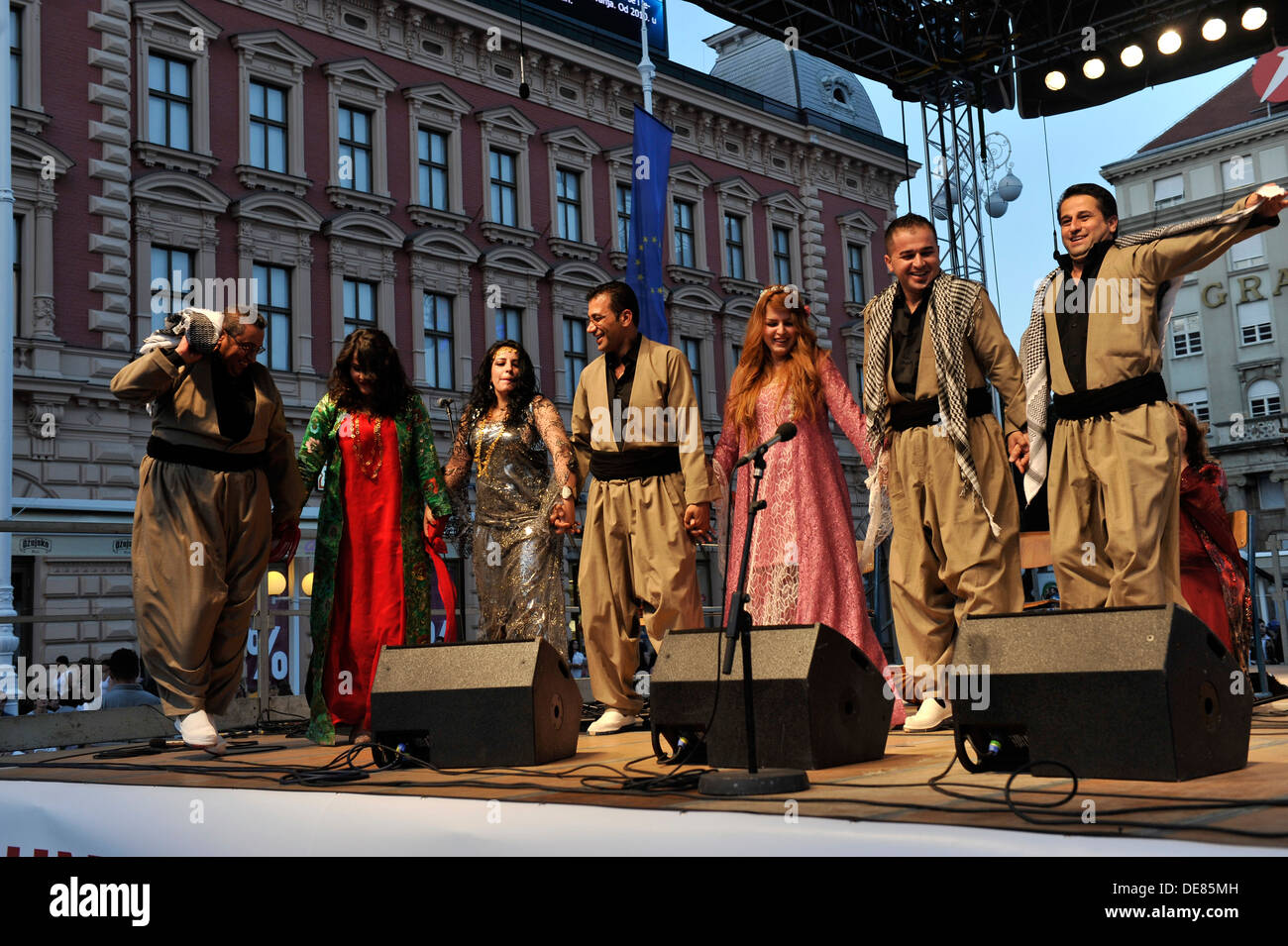 Members of folk groups from Iraq in Kurdish folk costume during the ...