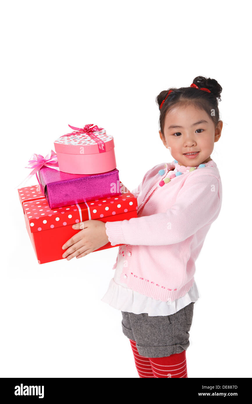 Girl holding gift boxes Stock Photo - Alamy