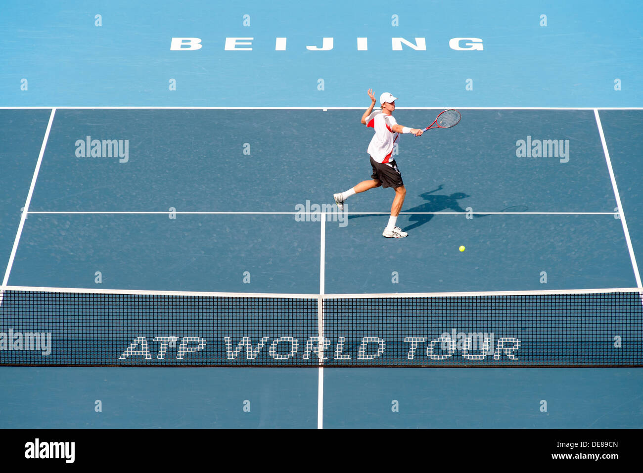 Kevin Andersen of South Africa plays a return shot at the China Open ...