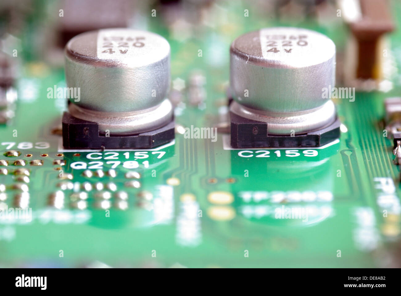 installed on printed circuits condenser Stock Photo - Alamy