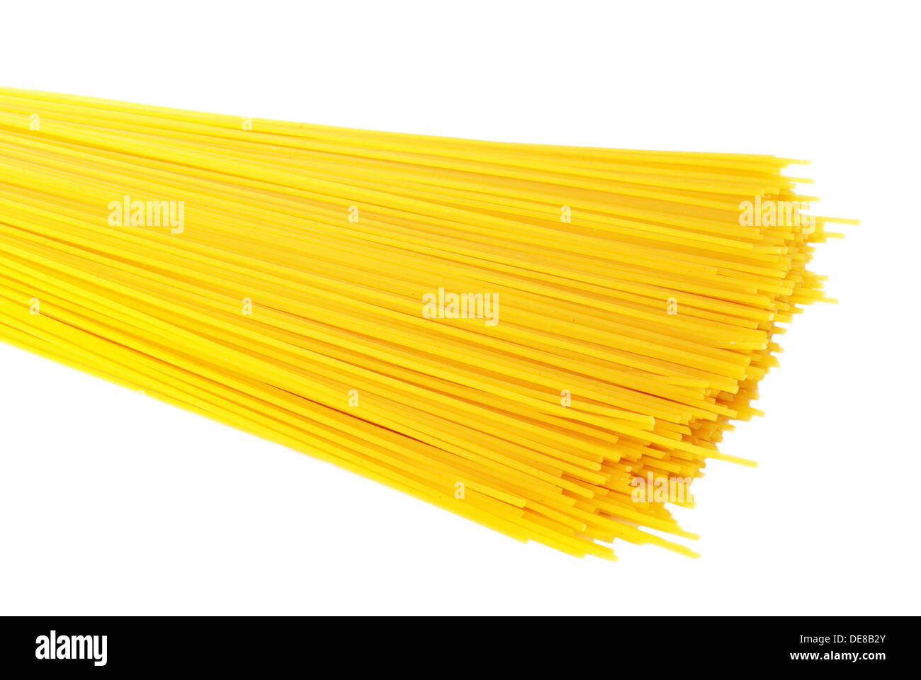 yellow pasta on white background Stock Photo - Alamy
