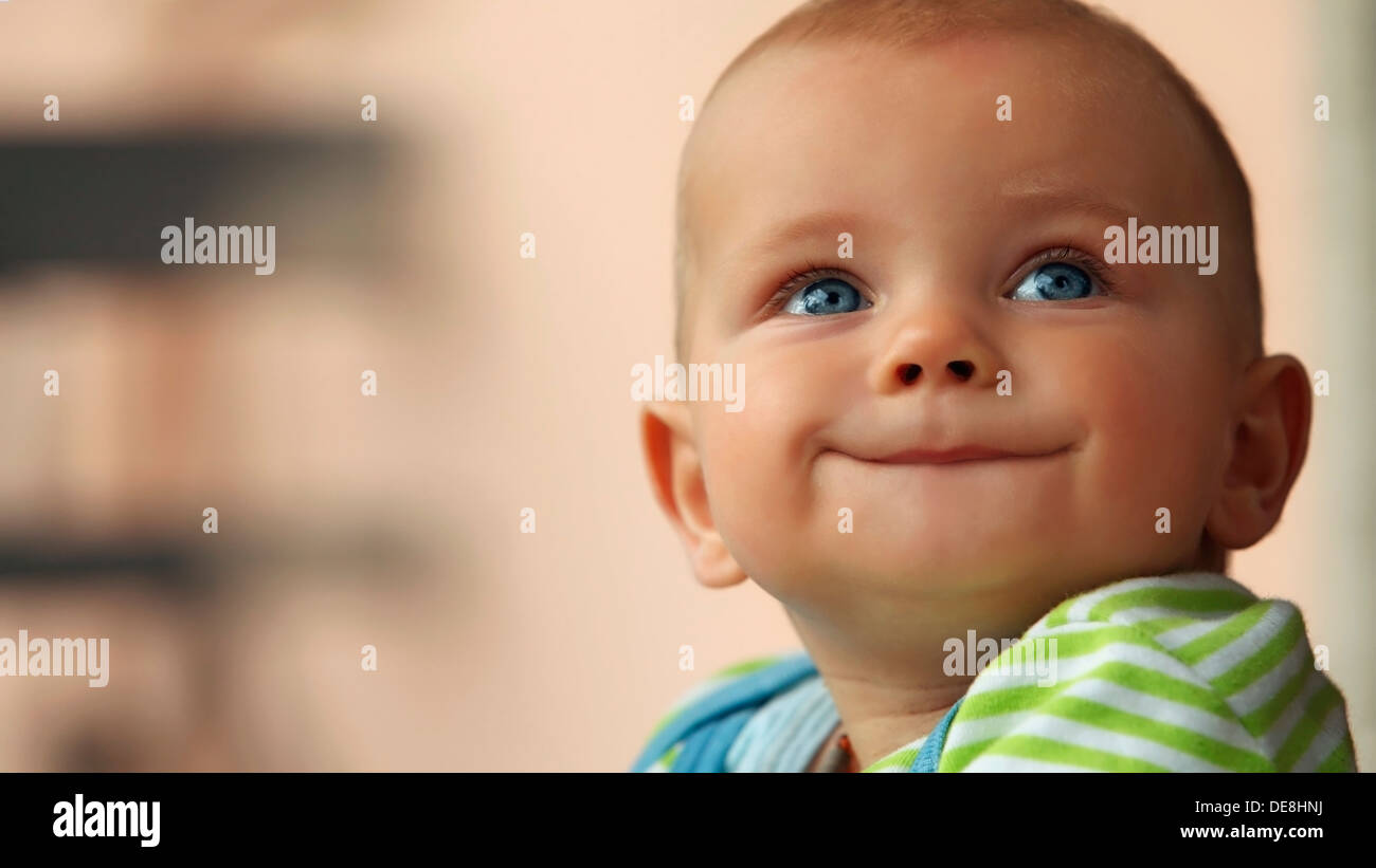 Germany, Bavaria, Baby boy biting lip, close up Stock Photo - Alamy