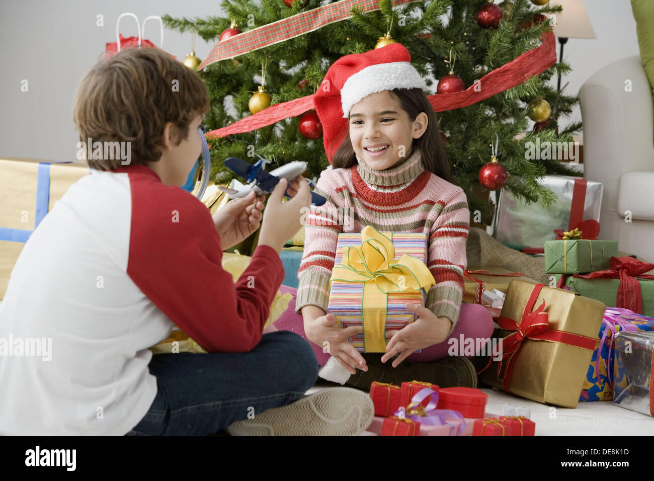 Girl boy each other children profile hi-res stock photography and ...