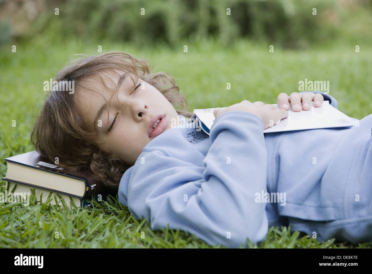 Boy Napping On Grass High Resolution Stock Photography and Images - Alamy