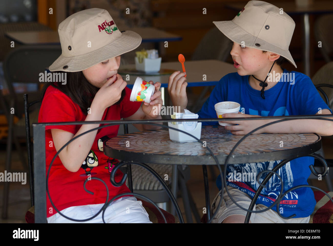Girl eating gelato hi-res stock photography and images - Alamy