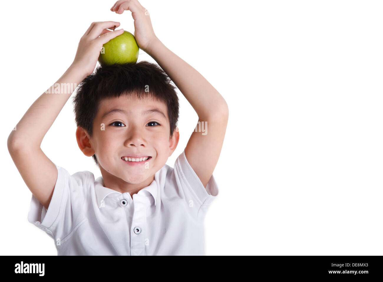 Boy with apple Stock Photo - Alamy