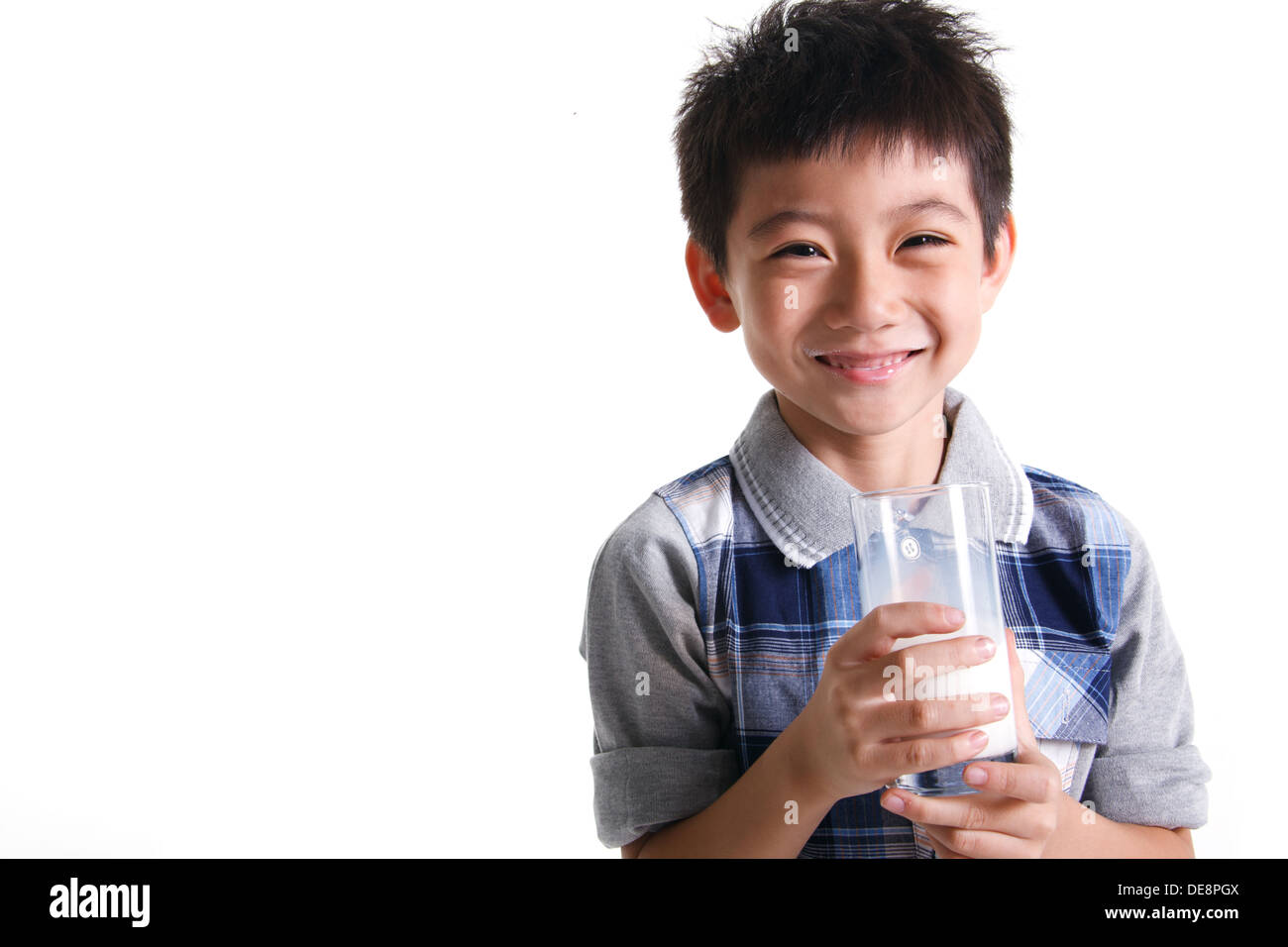 Boy drinking milk Stock Photo - Alamy