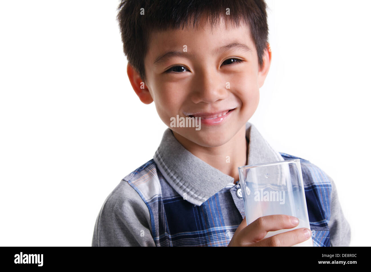 Boy drinking milk Stock Photo - Alamy