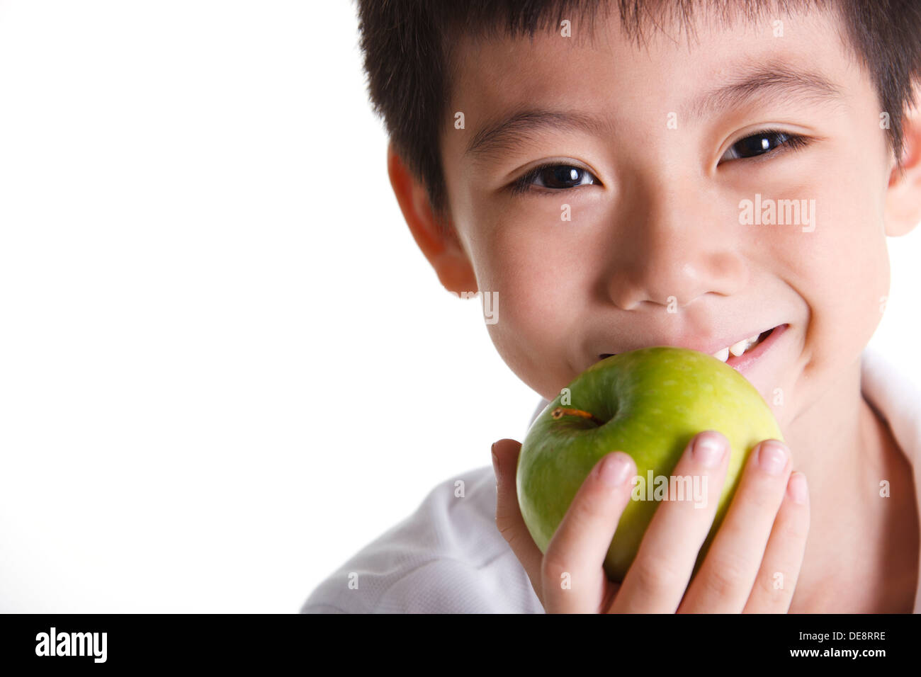 Beautiful boy eating apple hi-res stock photography and images - Alamy