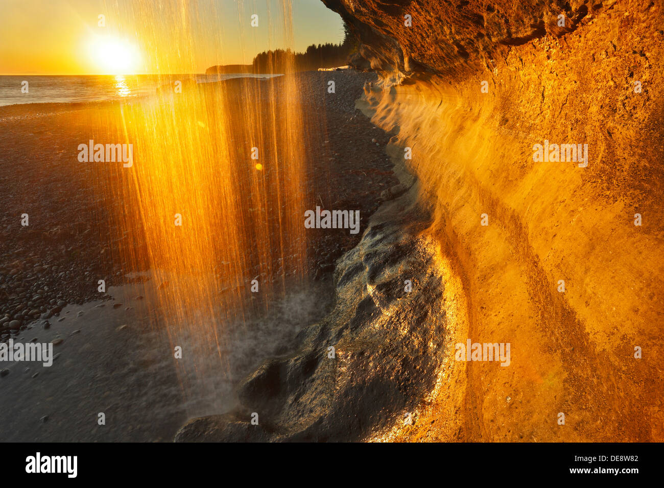Sandcut beach waterfall sunset jordan river hi-res stock photography ...