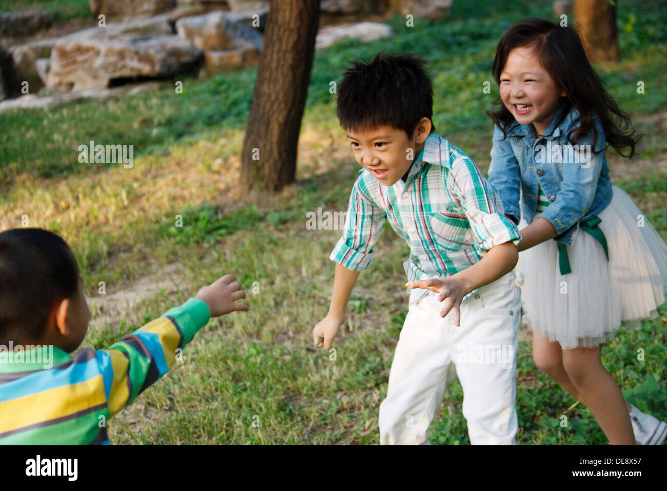 Children playing games outdoors Stock Photo - Alamy