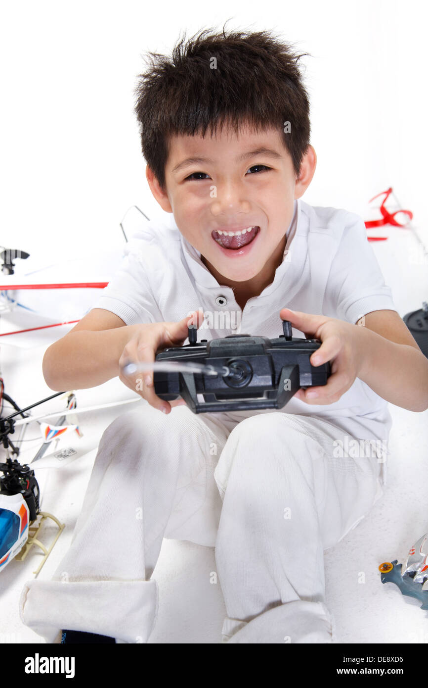 Boy playing toys Stock Photo - Alamy
