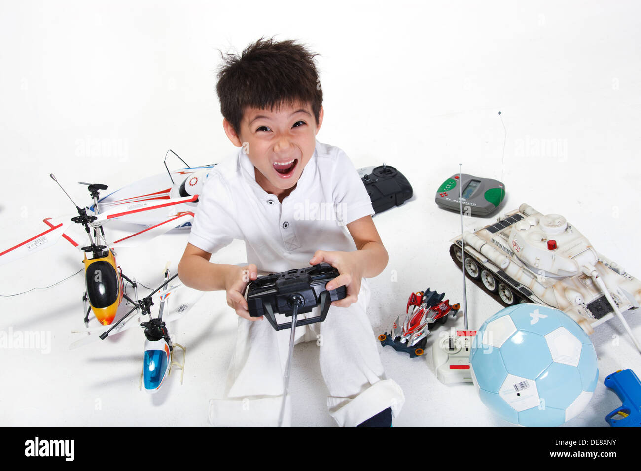Boy playing toys Stock Photo - Alamy
