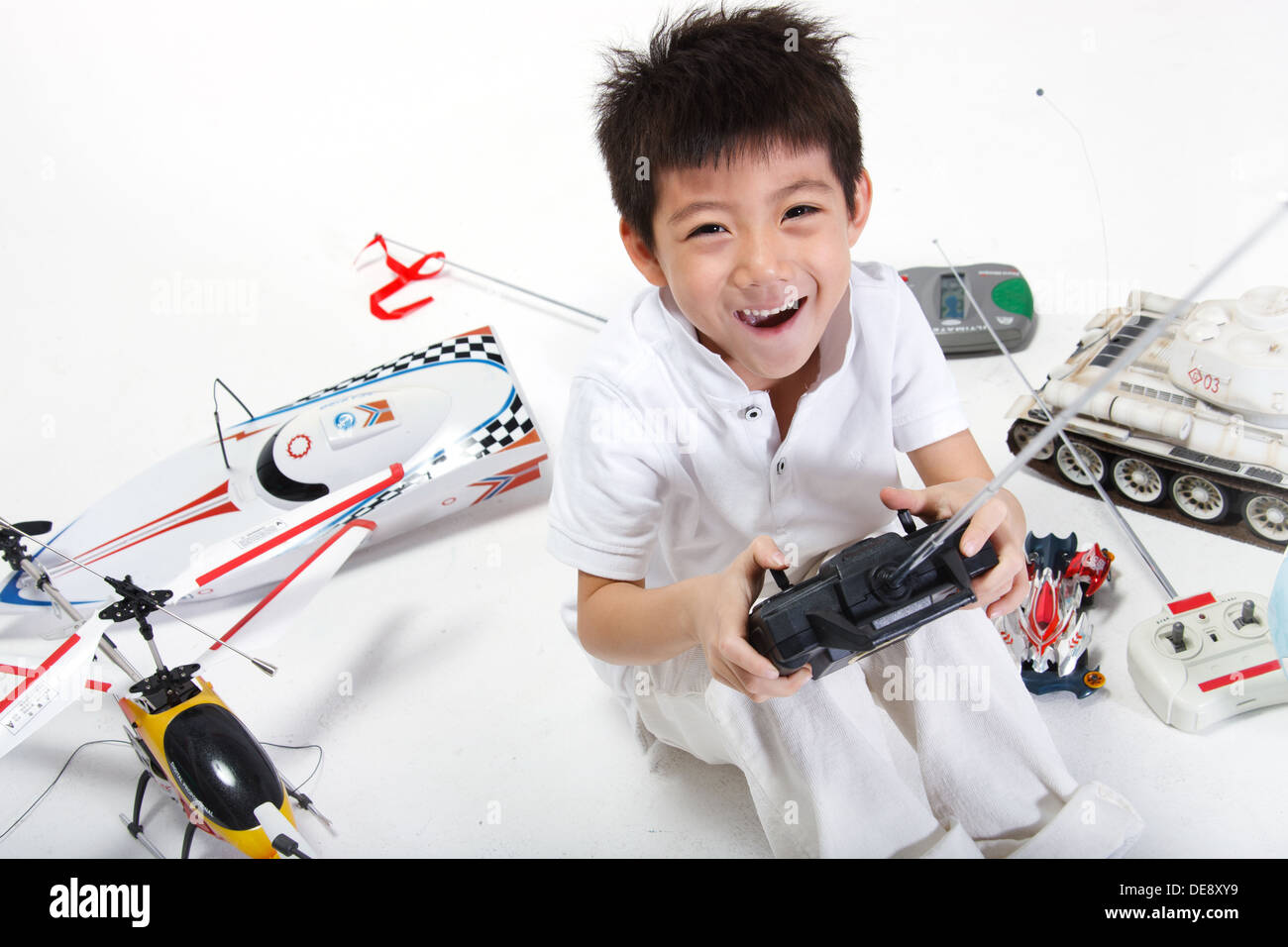 Boy playing toys Stock Photo - Alamy