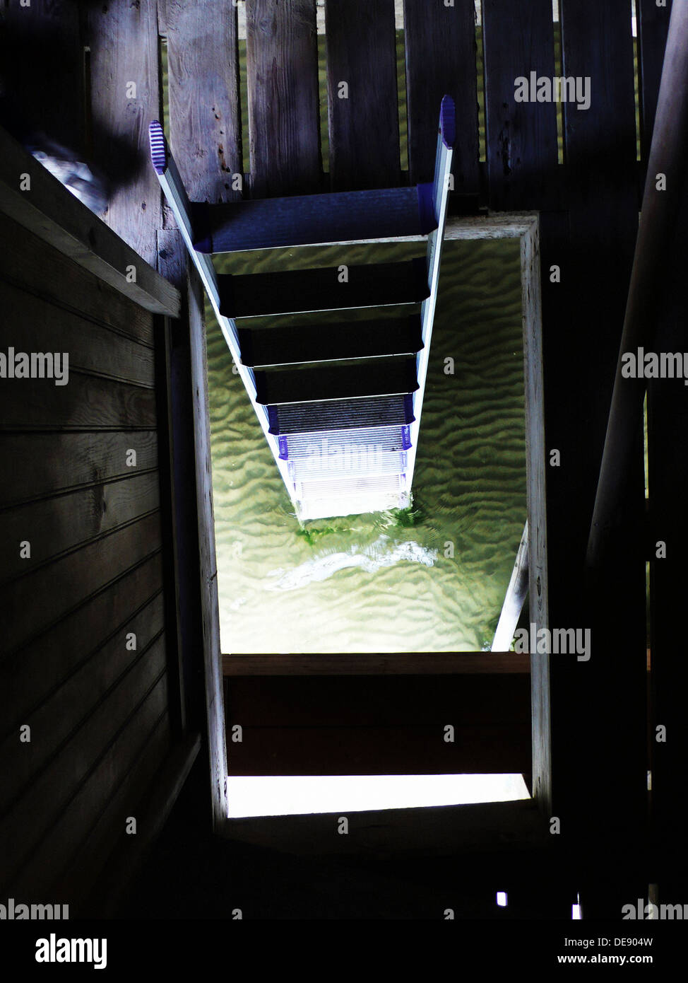 Descending ladder hi-res stock photography and images - Alamy