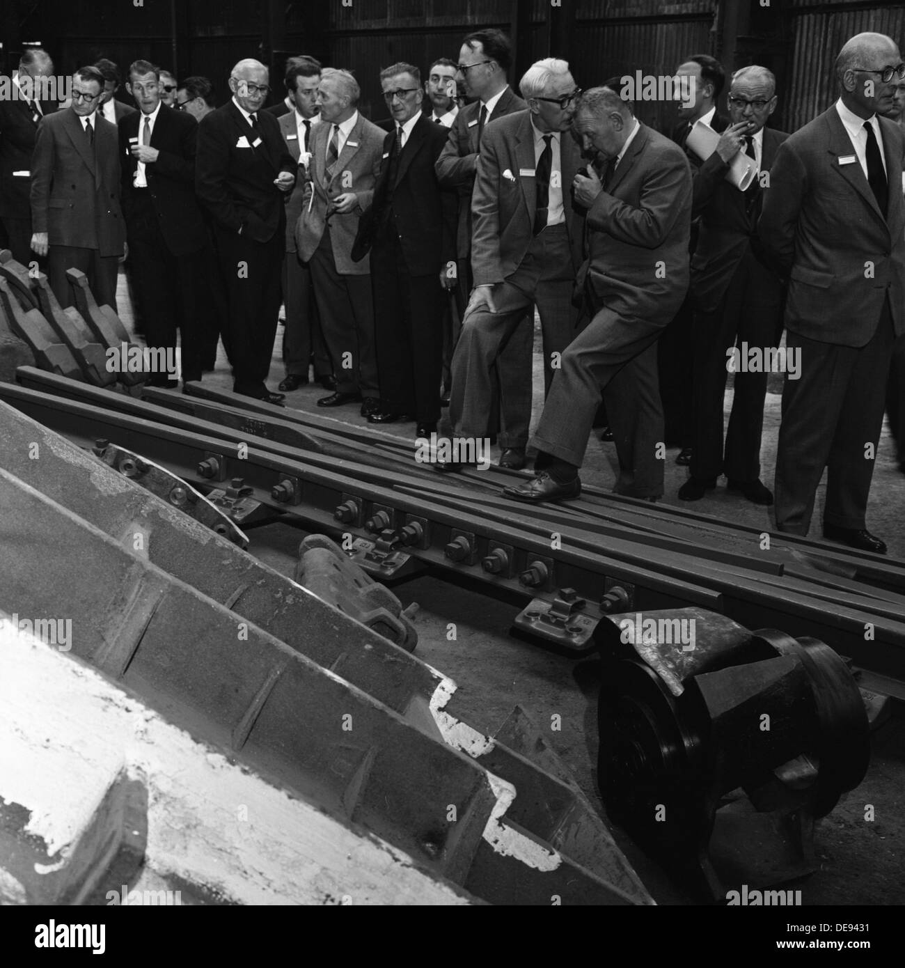 Inspecting a tram junction, made at the Edgar Allen Steel Foundry ...