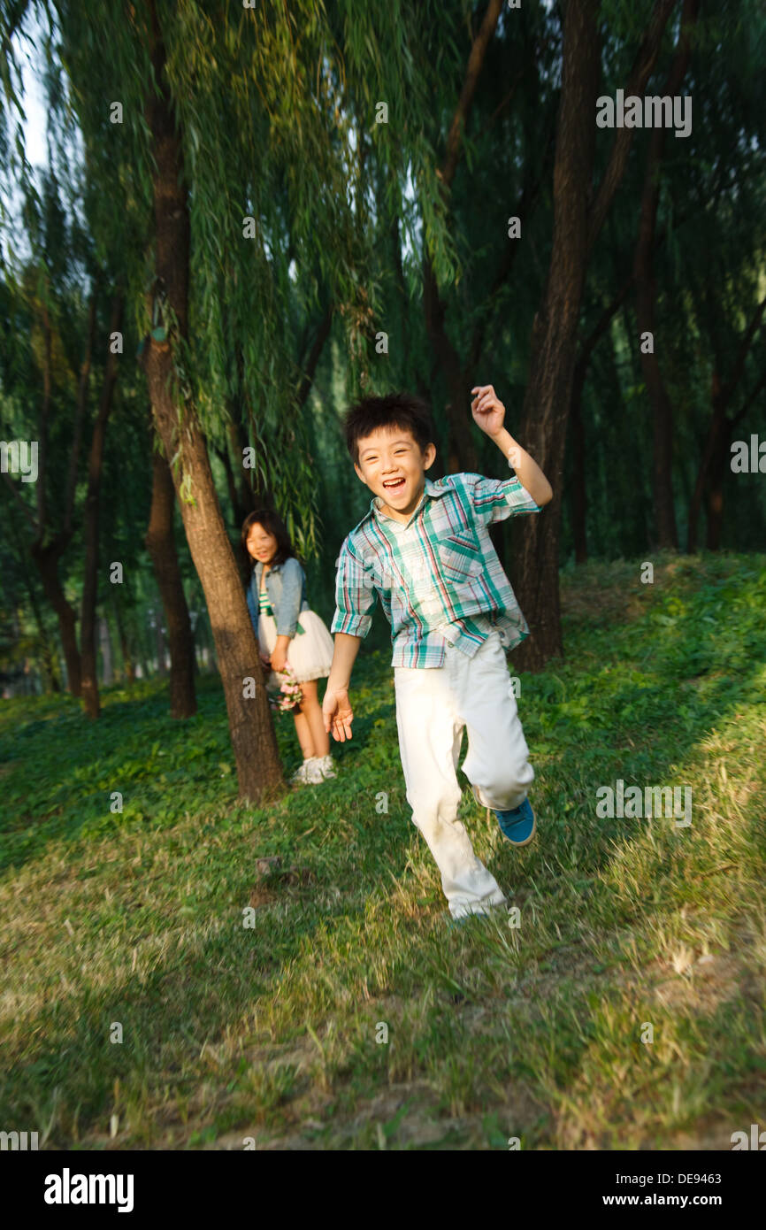 Boy standing in running hi-res stock photography and images - Alamy