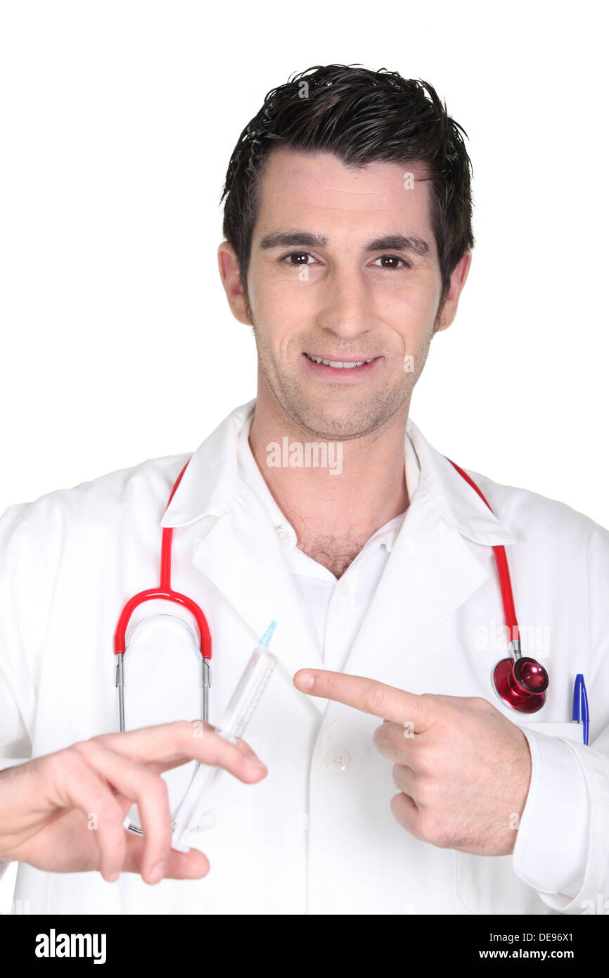 Doctor pointing needle hi-res stock photography and images - Alamy