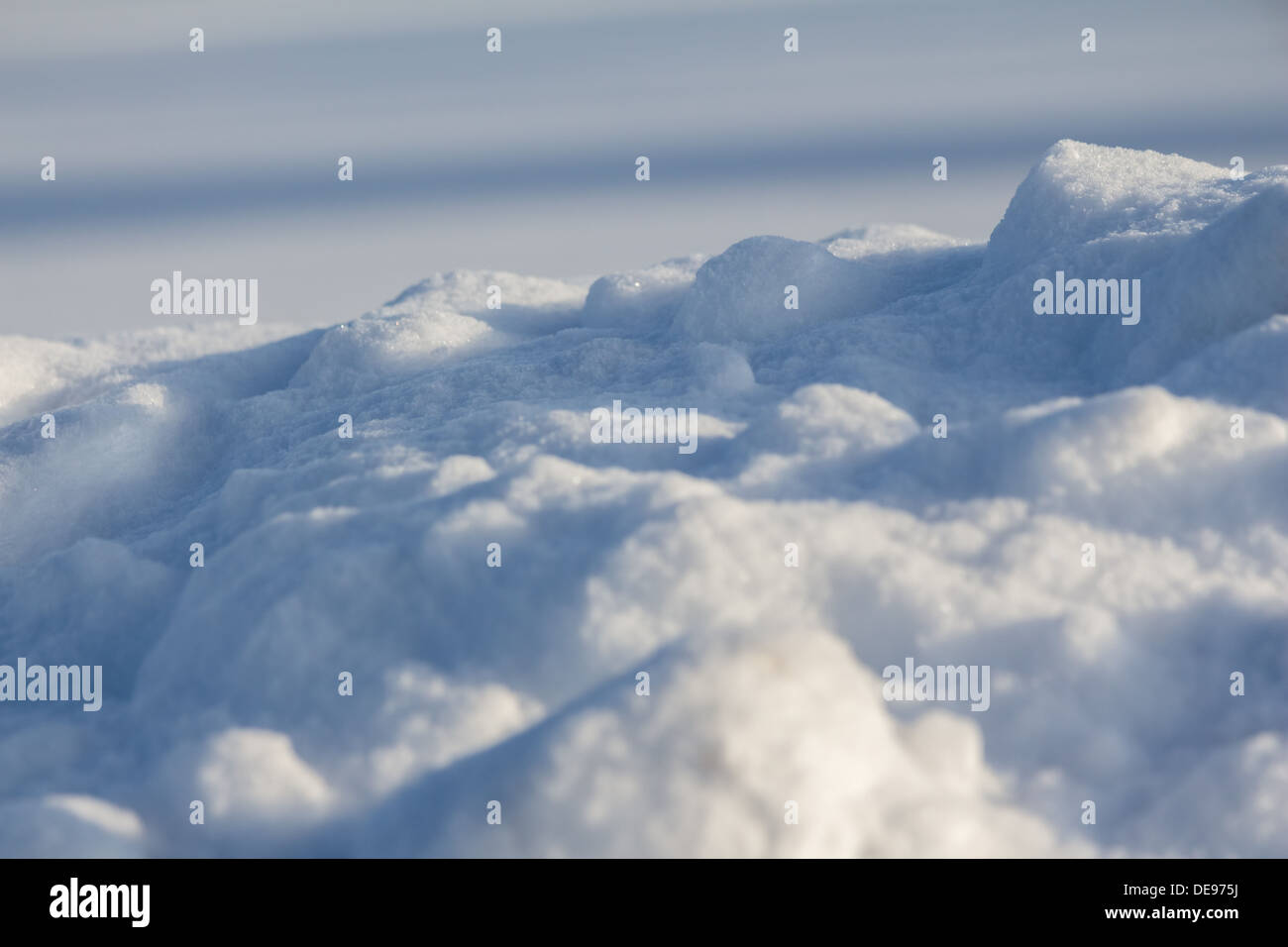 Cool picture of fine snow covering ice at the height of winter. With ...