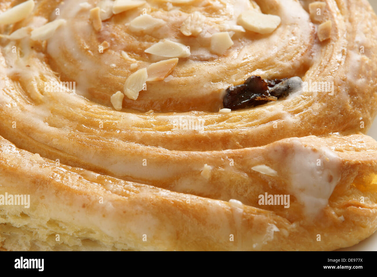 Danish pastry close up with toasted almonds Stock Photo - Alamy