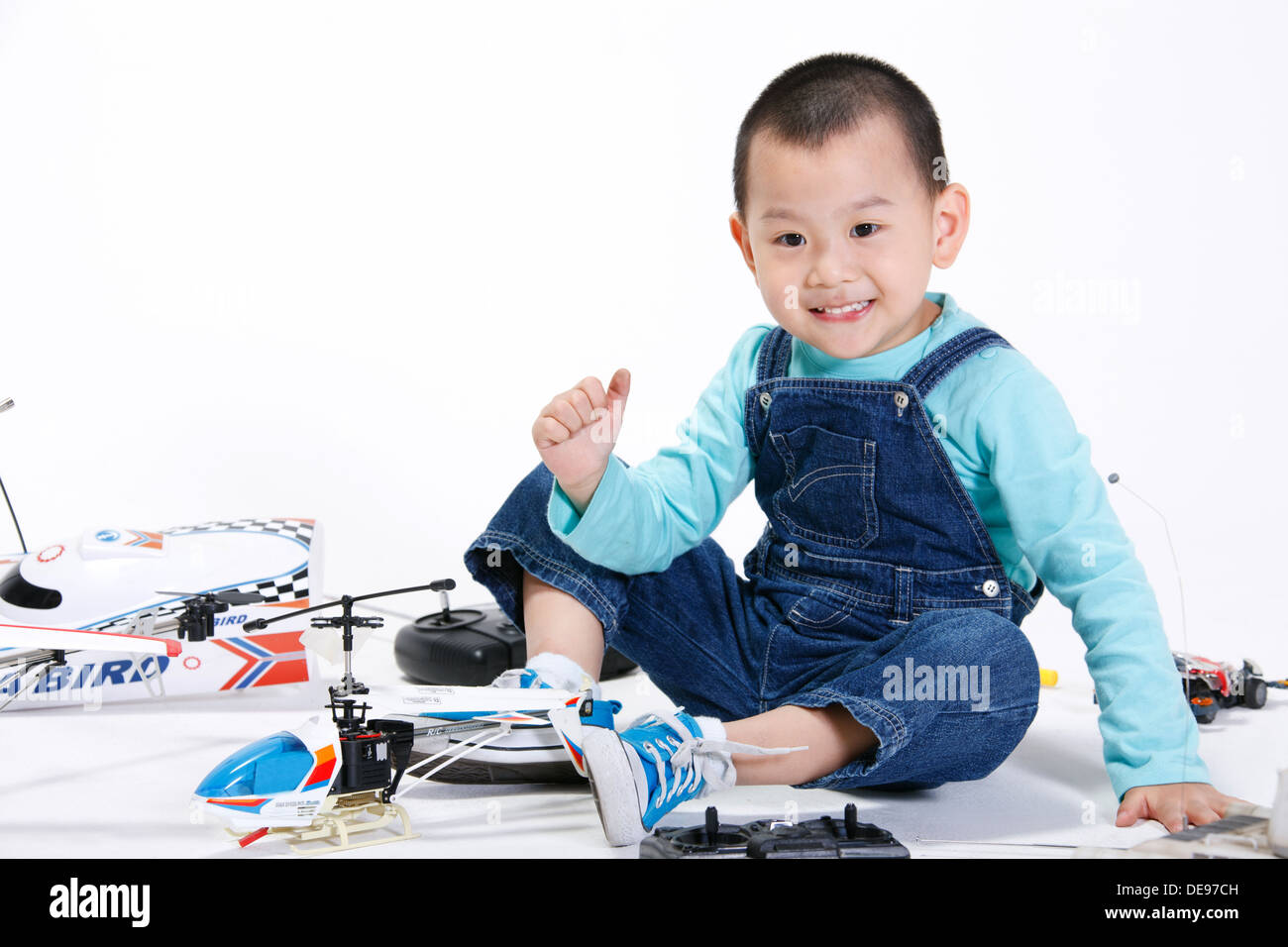 Boy with toys Stock Photo - Alamy