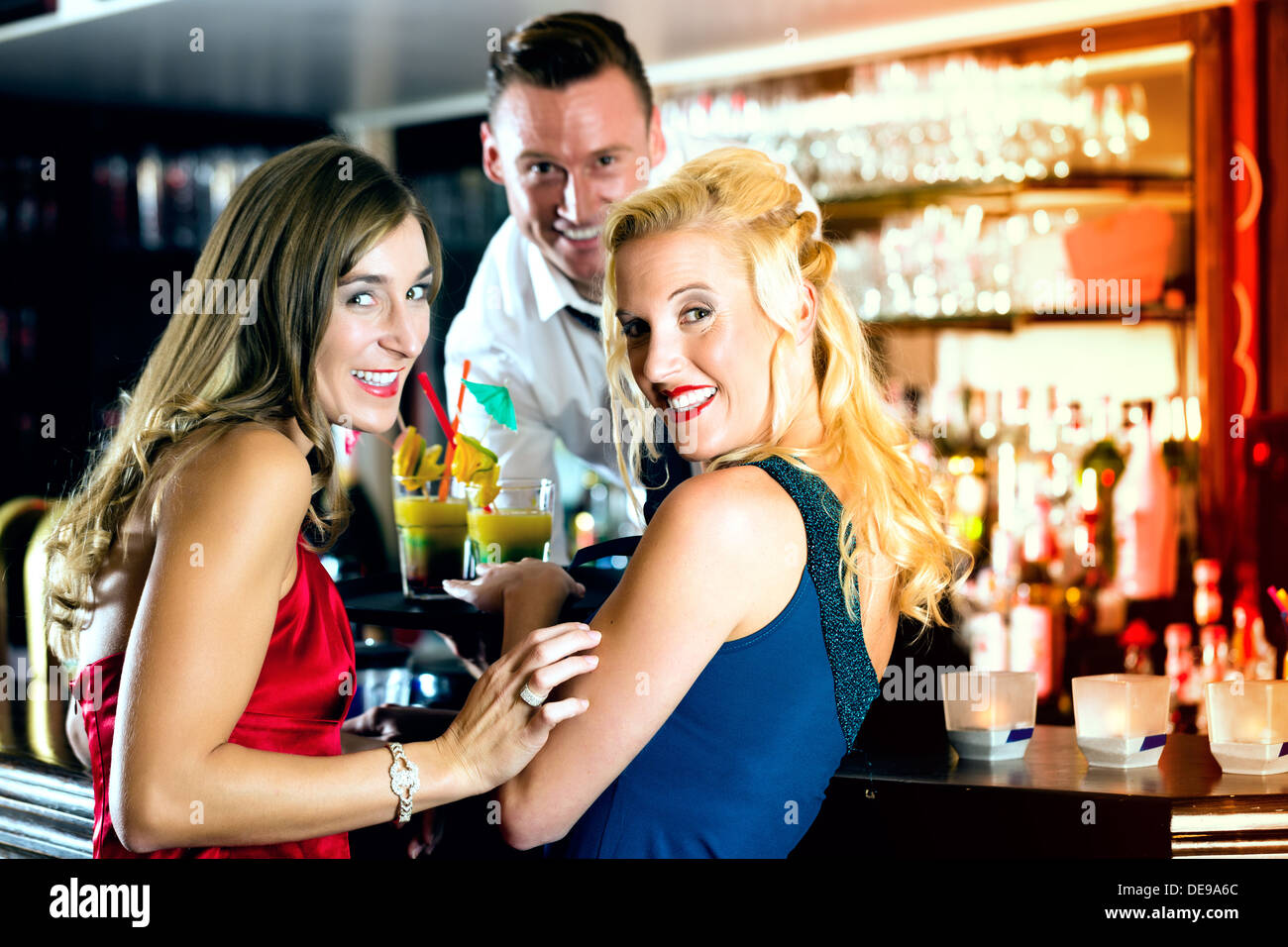 Party woman serve drinks party hi-res stock photography and images - Alamy