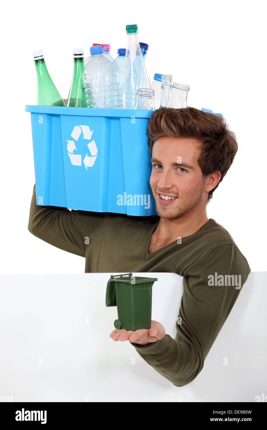 Man recycling bottles Stock Photo - Alamy