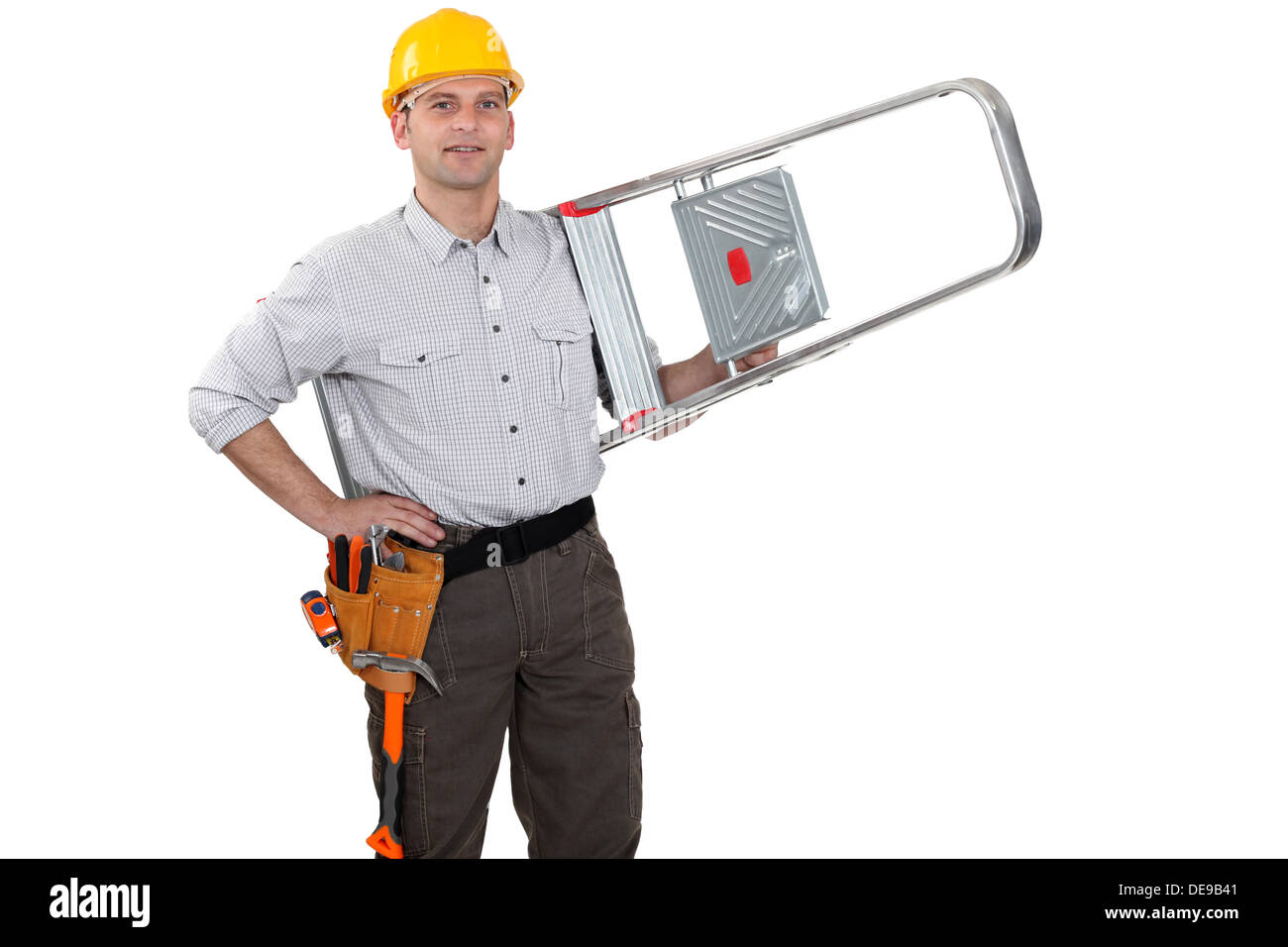 Worker carrying ladder Stock Photo - Alamy