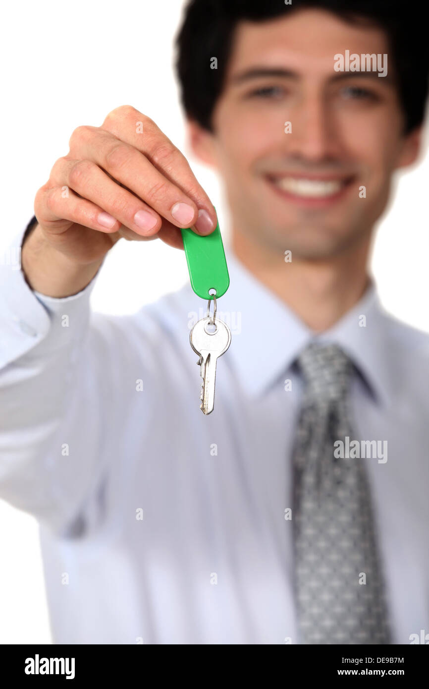Estate agent with a key Stock Photo - Alamy