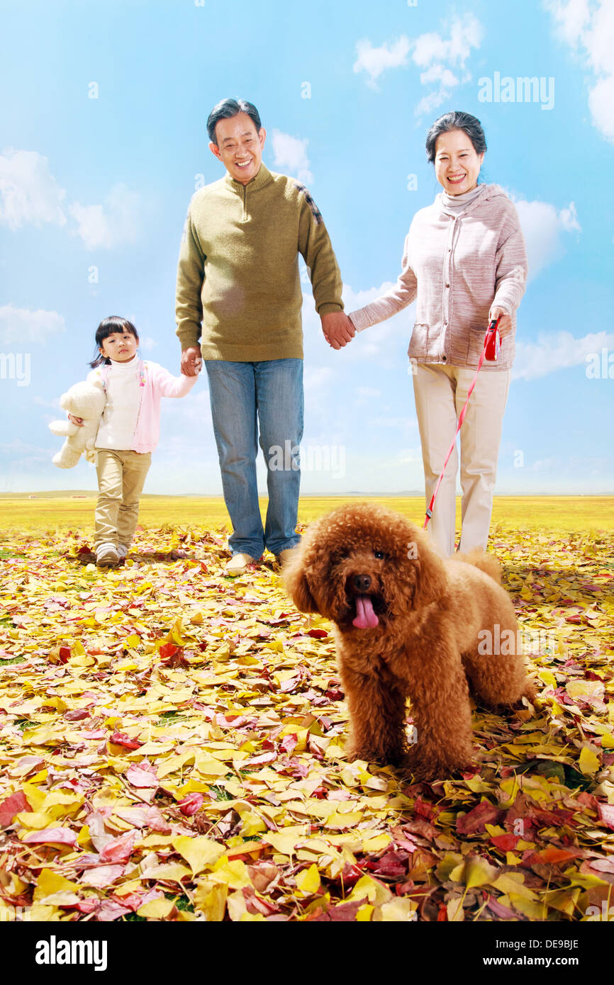 Family in autumn Stock Photo - Alamy