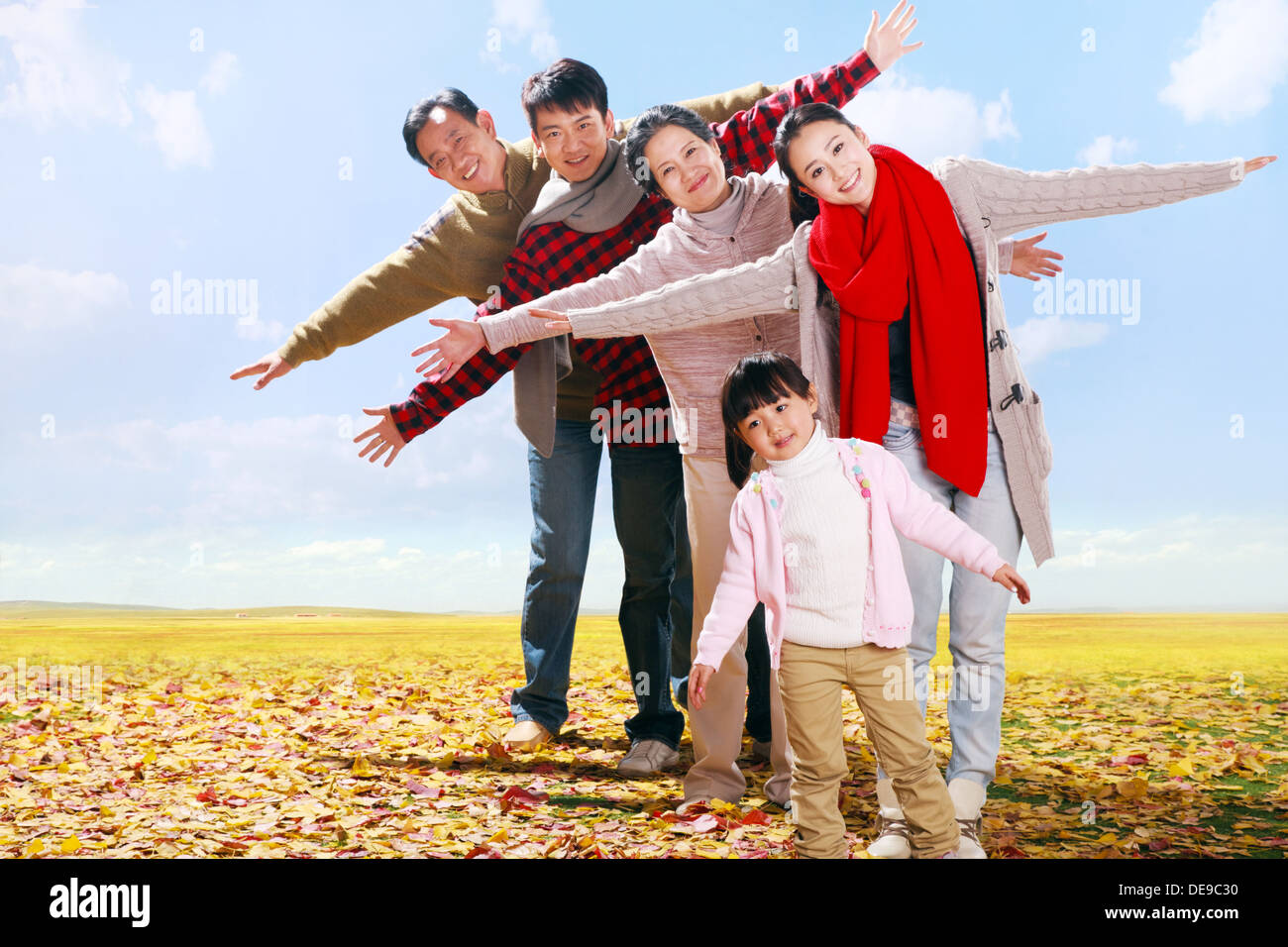 Family in autumn Stock Photo - Alamy