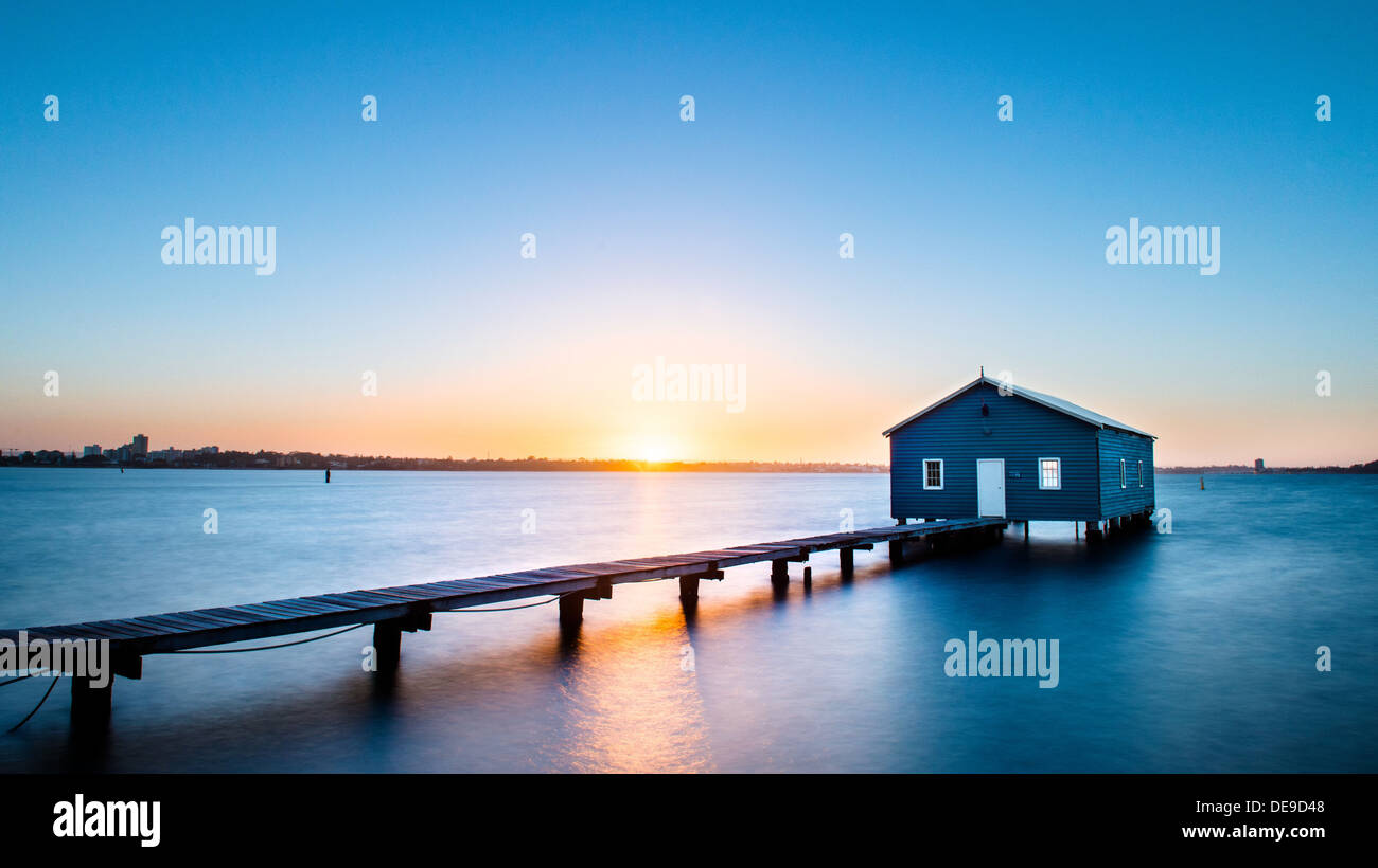A blue rowing boat shed taken on a summers morning Stock Photo - Alamy