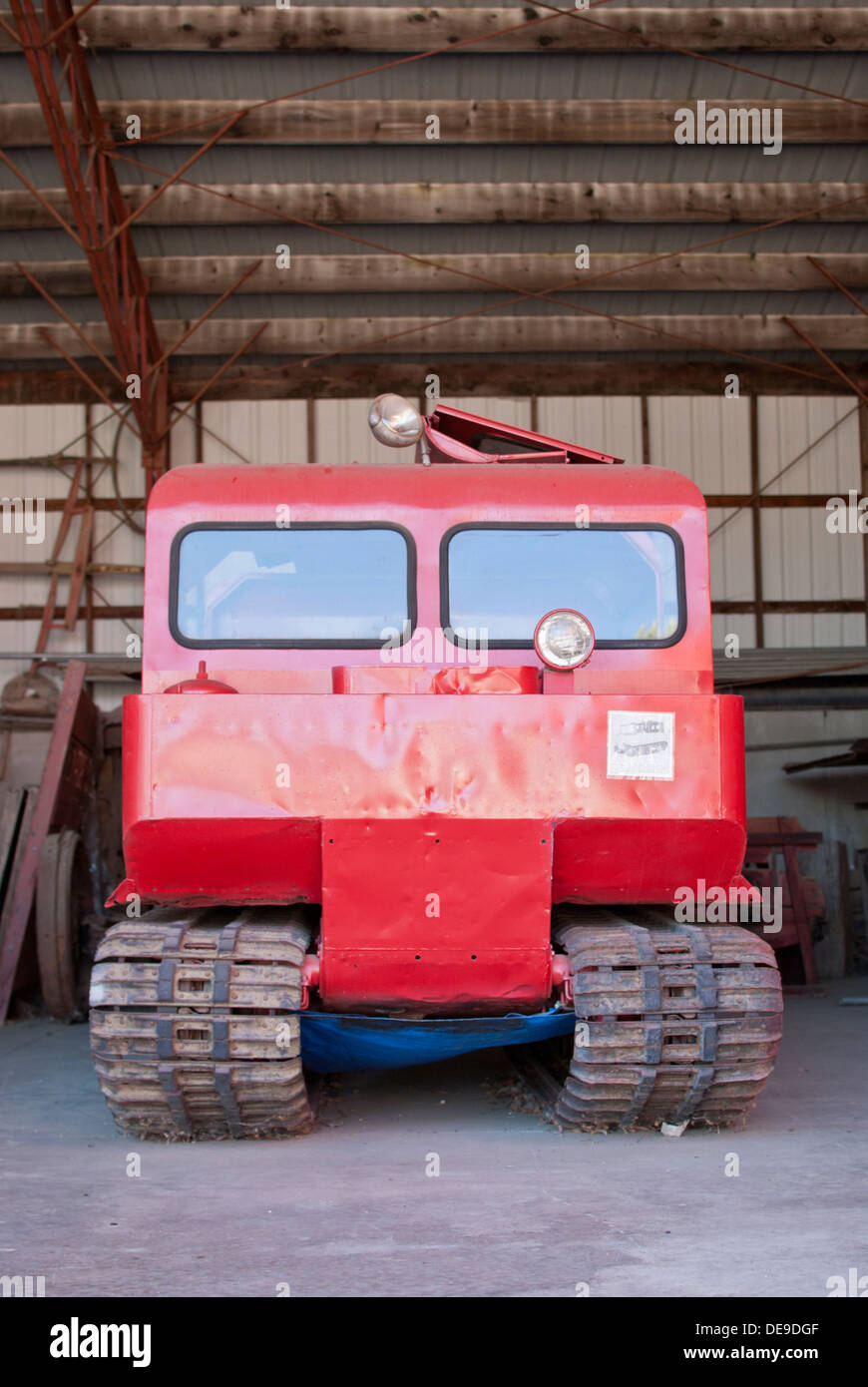 An old "Weasel" vehicle for electric linemen to travel through deep ...