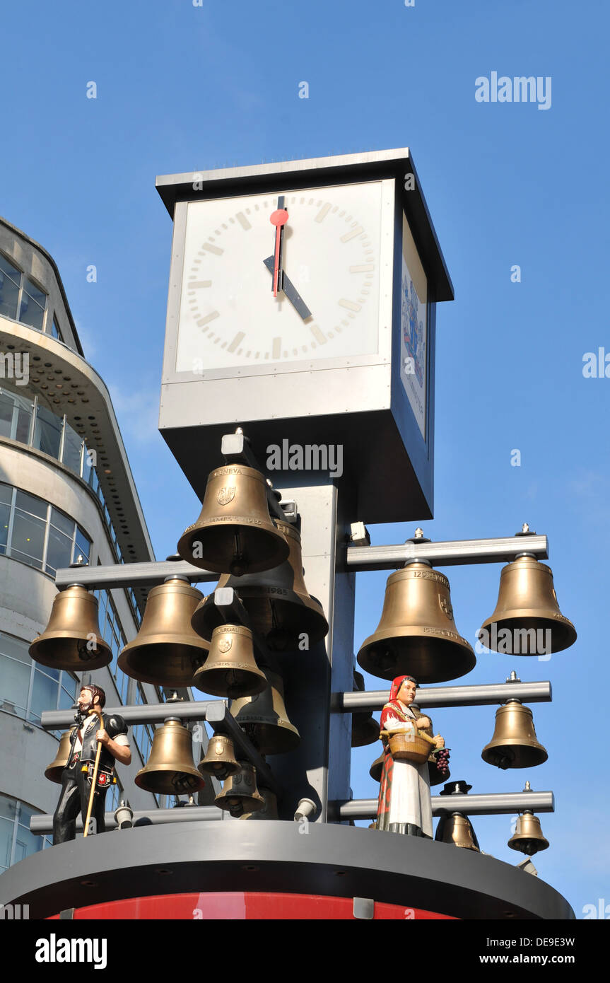 Old bell clock showing five o'clock sharp Stock Photo - Alamy