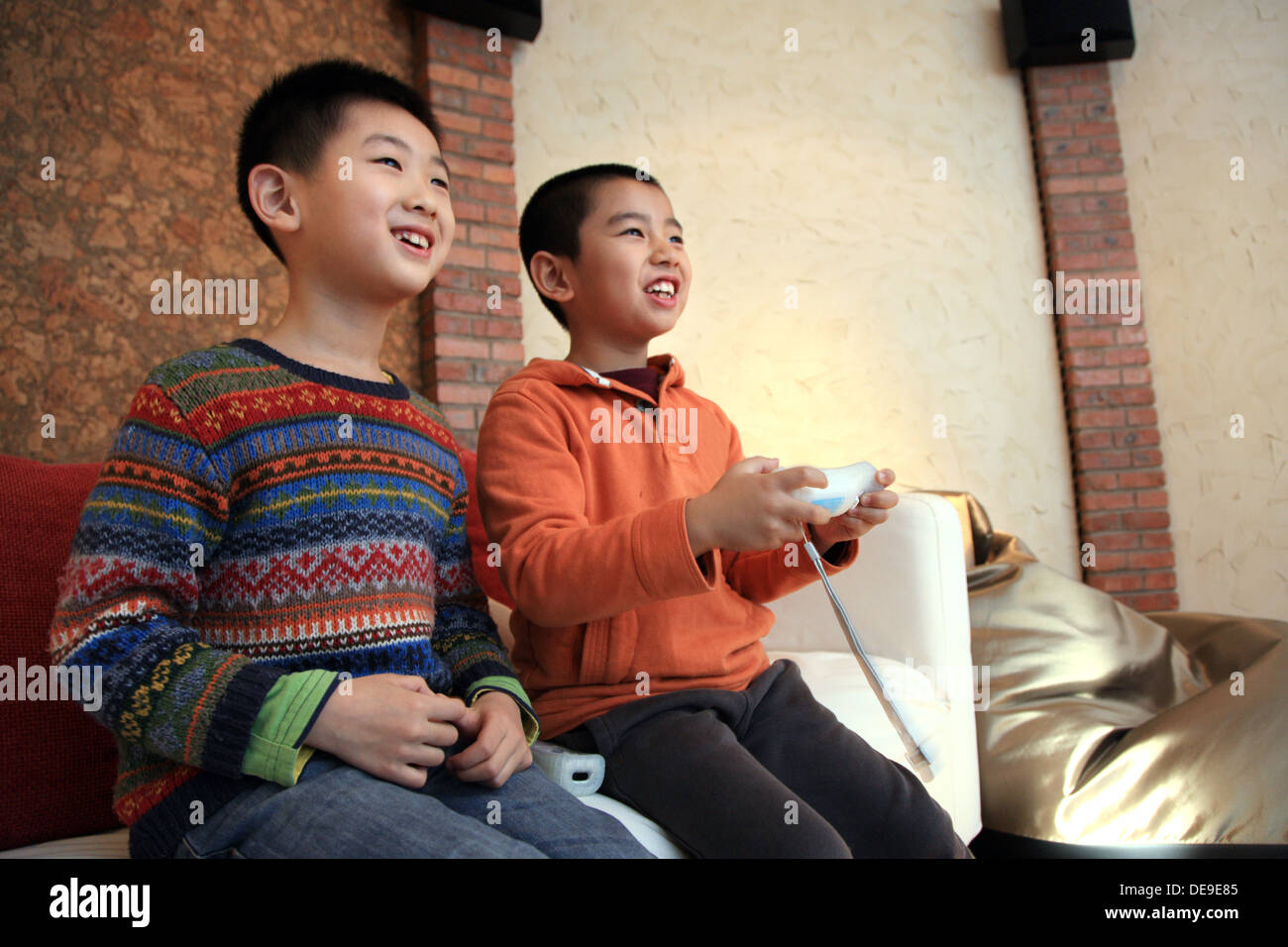 Two boys playing games Stock Photo - Alamy