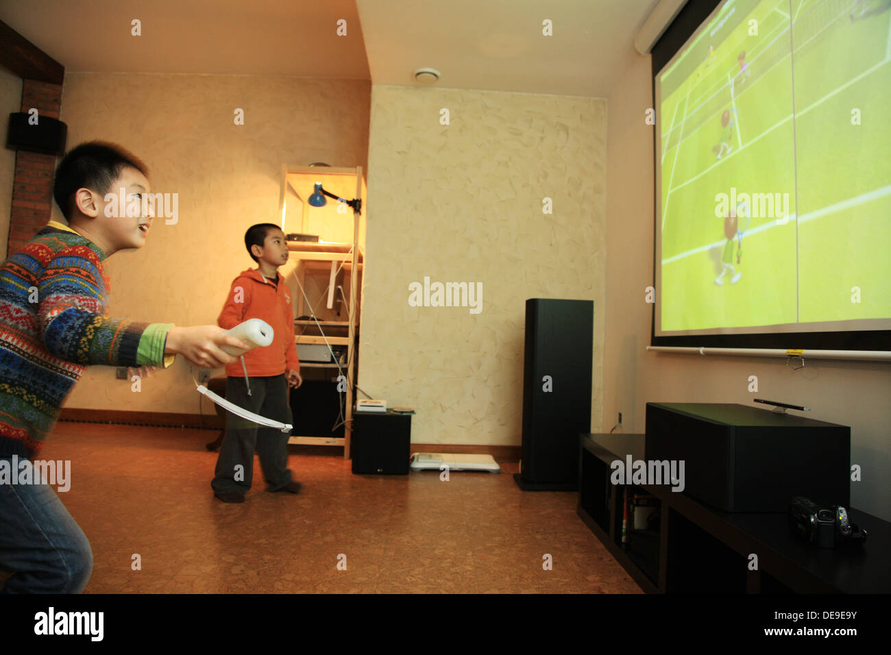 Two boys playing games Stock Photo - Alamy